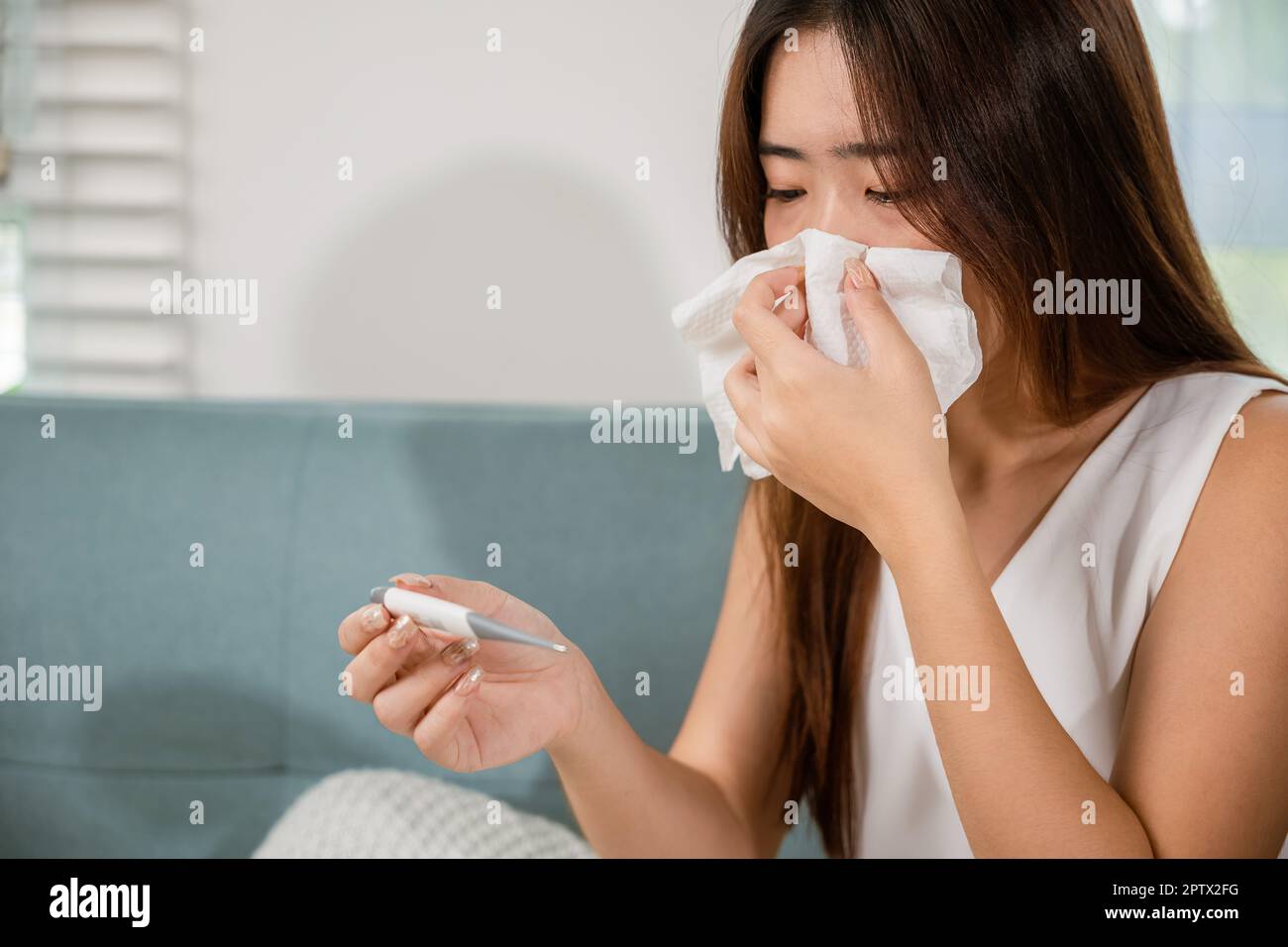 Sick woman have symptom sick high fever she checking her temperature ...
