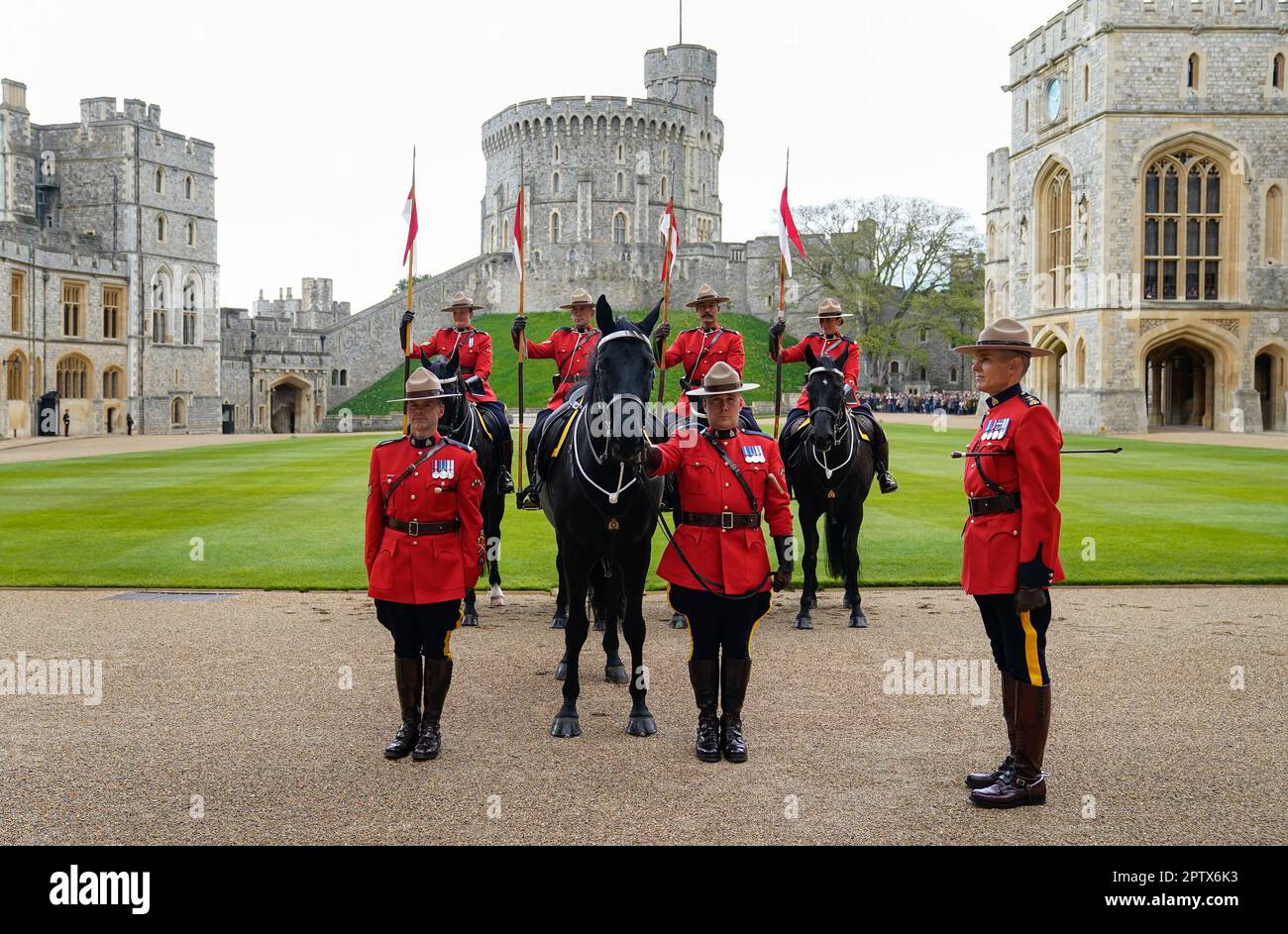 Member of the Royal Canadian Mounted Police (RCMP) stand next to 'Noble ...