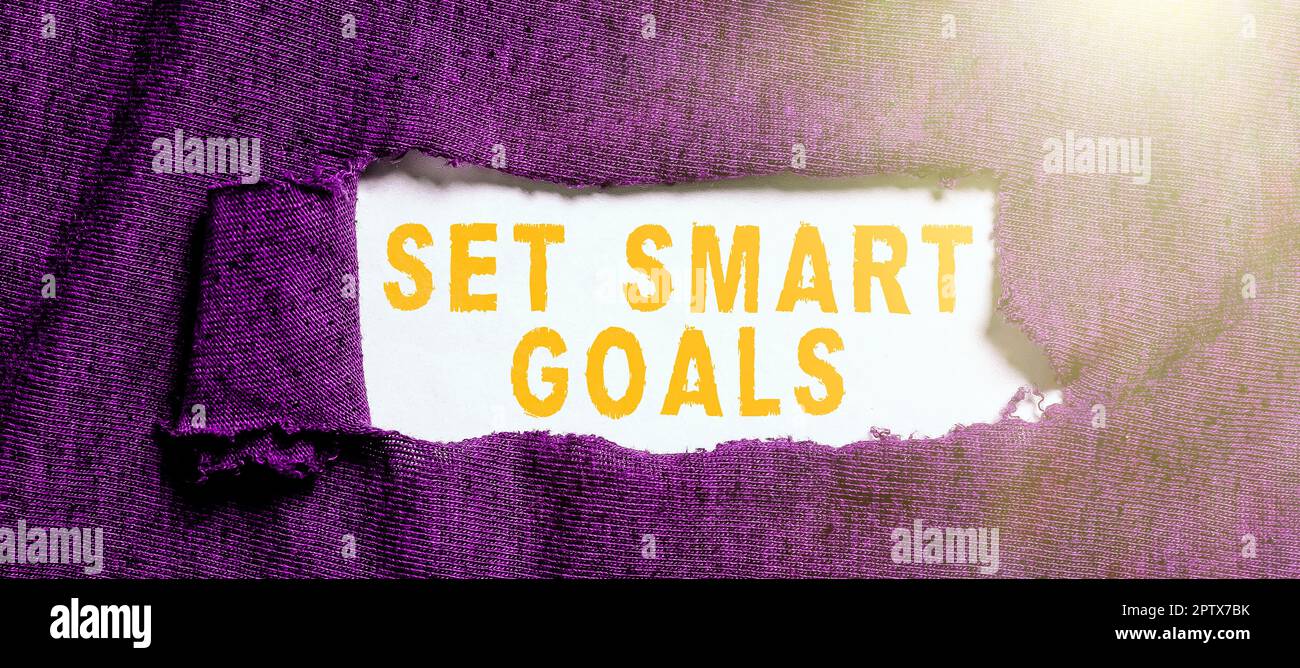 Hand writing sign Set Smart Goals, Business idea Establish achievable ...