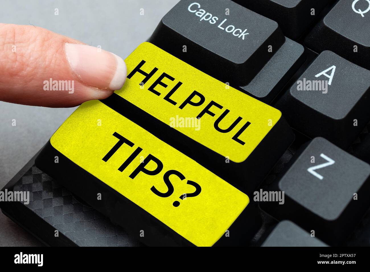 Conceptual caption Helpful Tips, Word Written on advices given to be ...