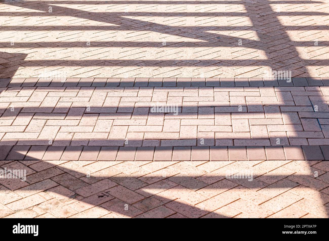 Pattern of shadows on the pavement, abstract background Stock Photo - Alamy
