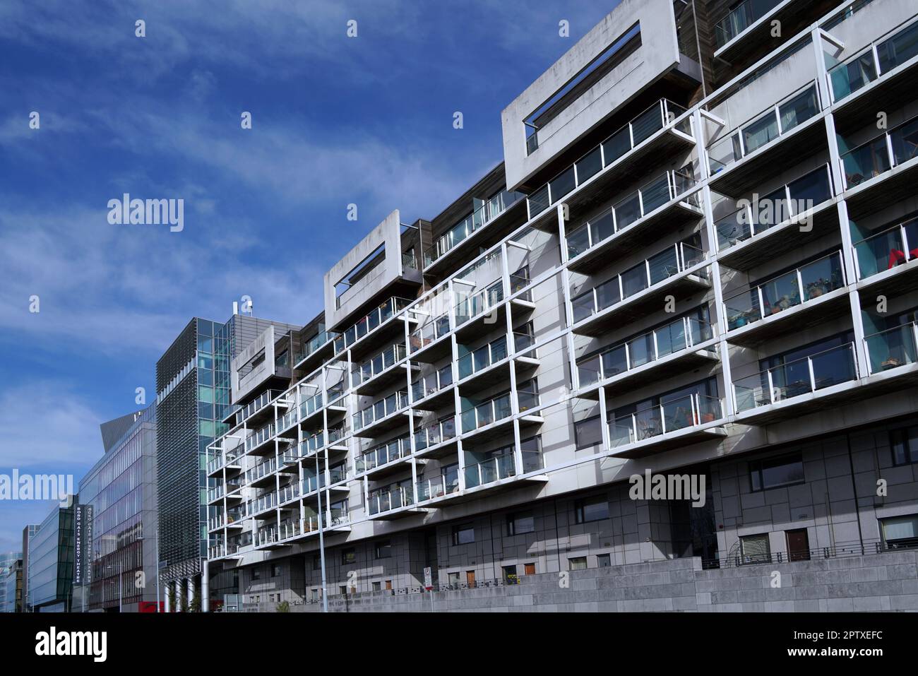 Street with modern low-rise apartment building Stock Photo - Alamy