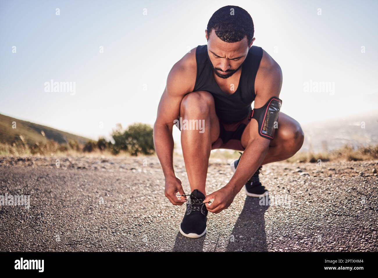 Fitness, tie and shoes of a man on a road for running, cardio workout ...