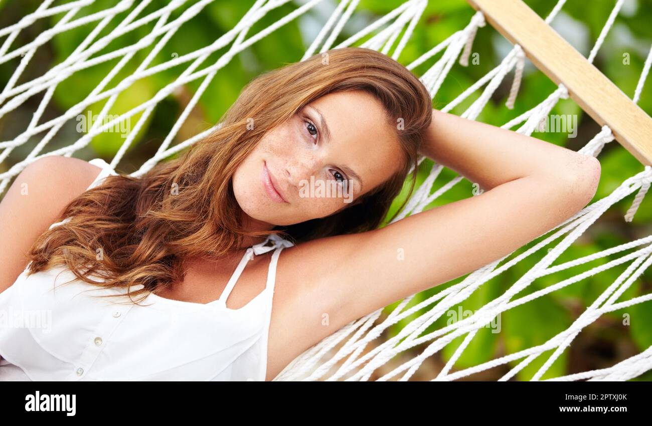 Beautiful young woman content to laze the day away - HolidaysVacations ...