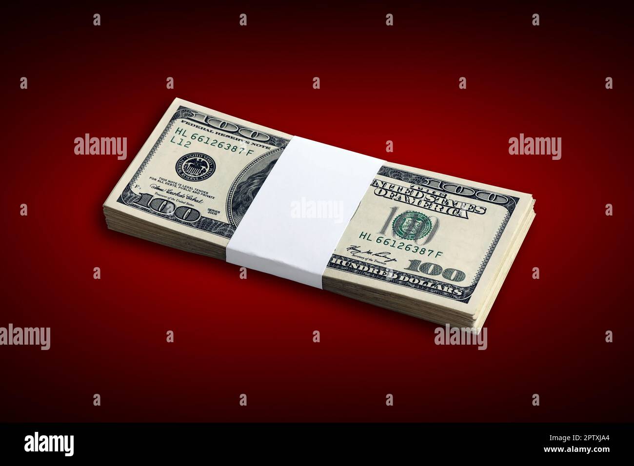 Bundle of US dollar bills on crimson red background. Pack of american ...