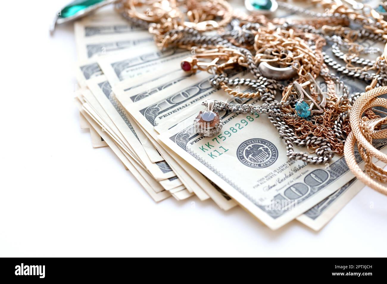 Many expensive golden and silver jewerly rings, earrings and necklaces ...