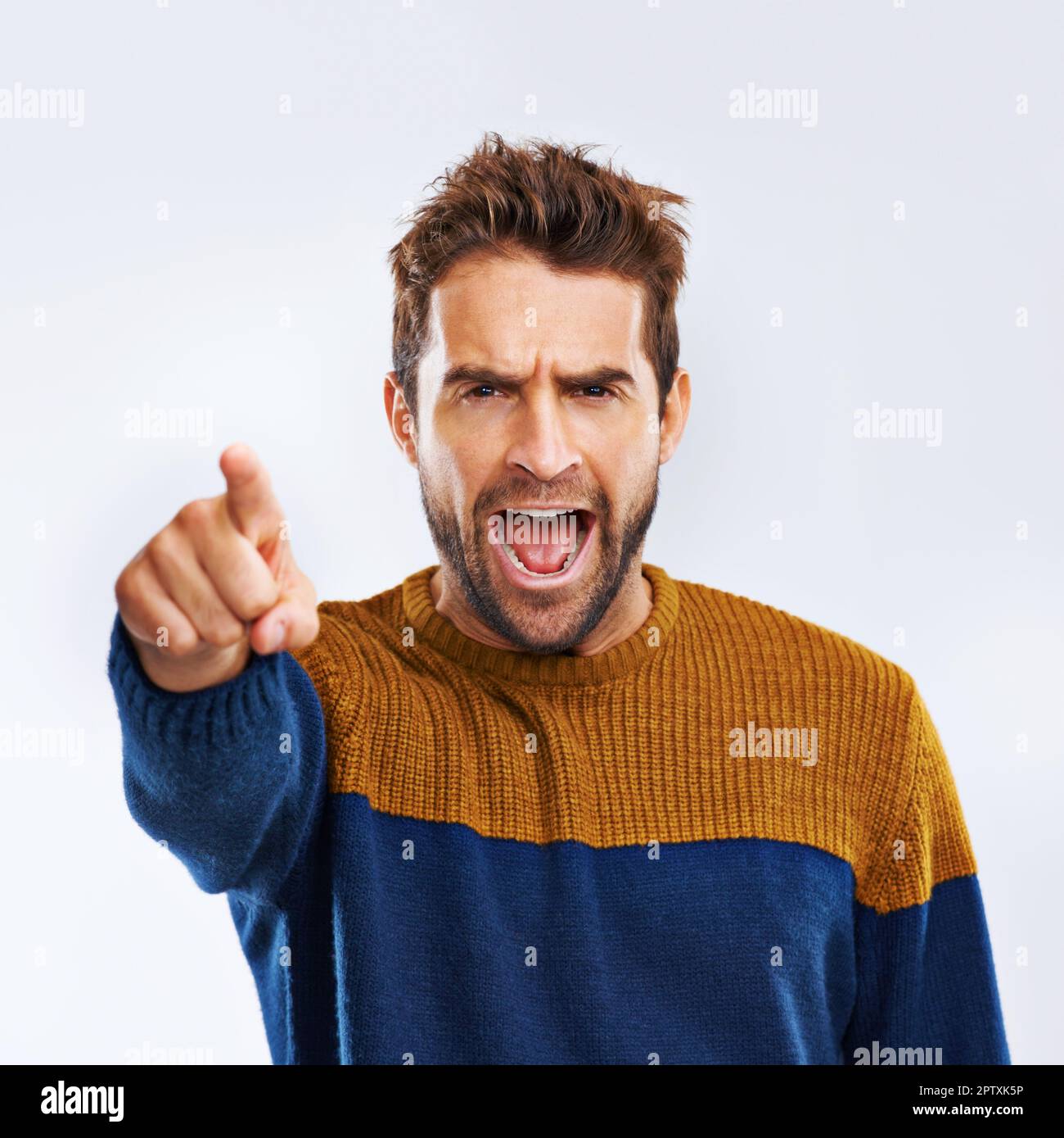 Angry guy yelling finger pointing hi-res stock photography and images ...