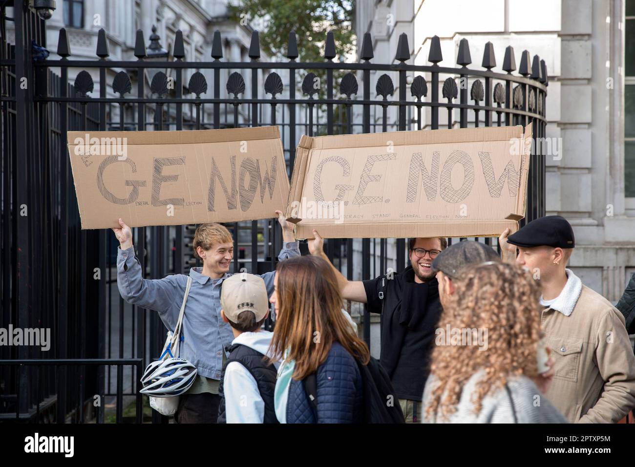 Cardboard messages demanding an immediate general election are held in ...