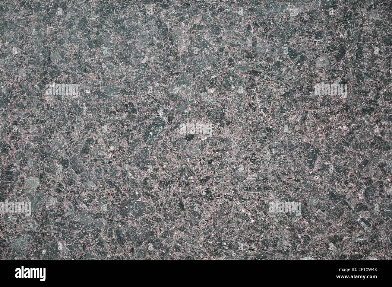 Monochromatic texture of granite surface. Detailed photo of the treated ...