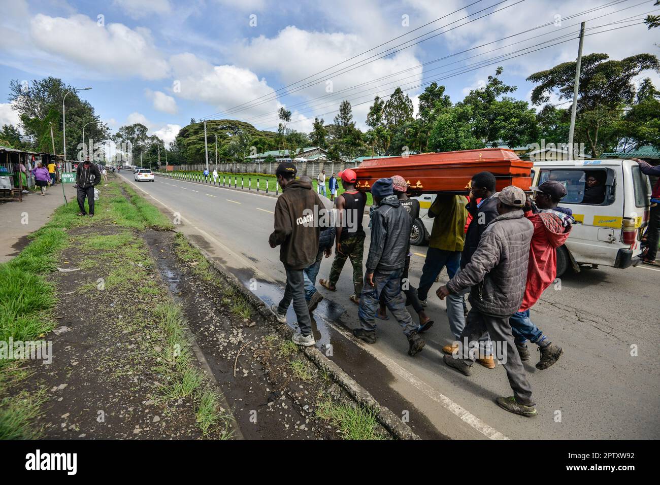 A group of waste pickers march with an empty casket demanding the body ...