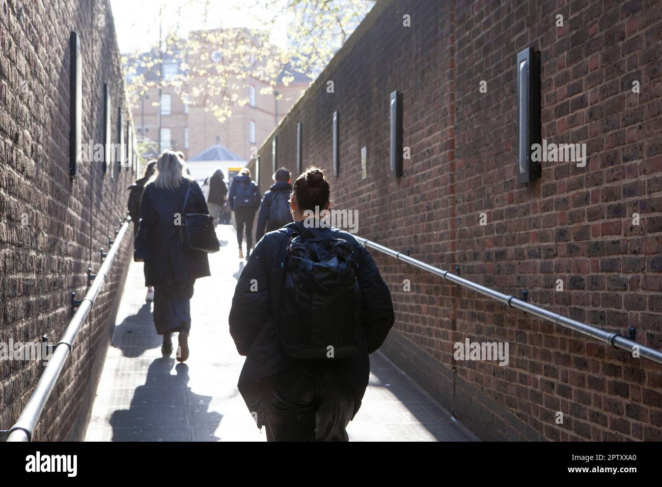 London, UK, 25 April 2023: At Pimlico tube station people walk up the ...