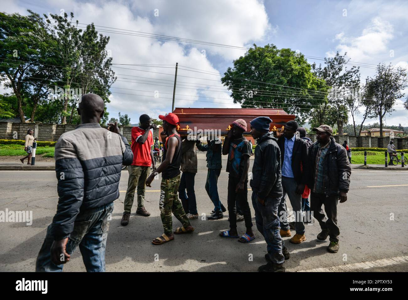 Nakuru, Kenya. 28th Apr, 2023. A group of waste pickers march with an ...