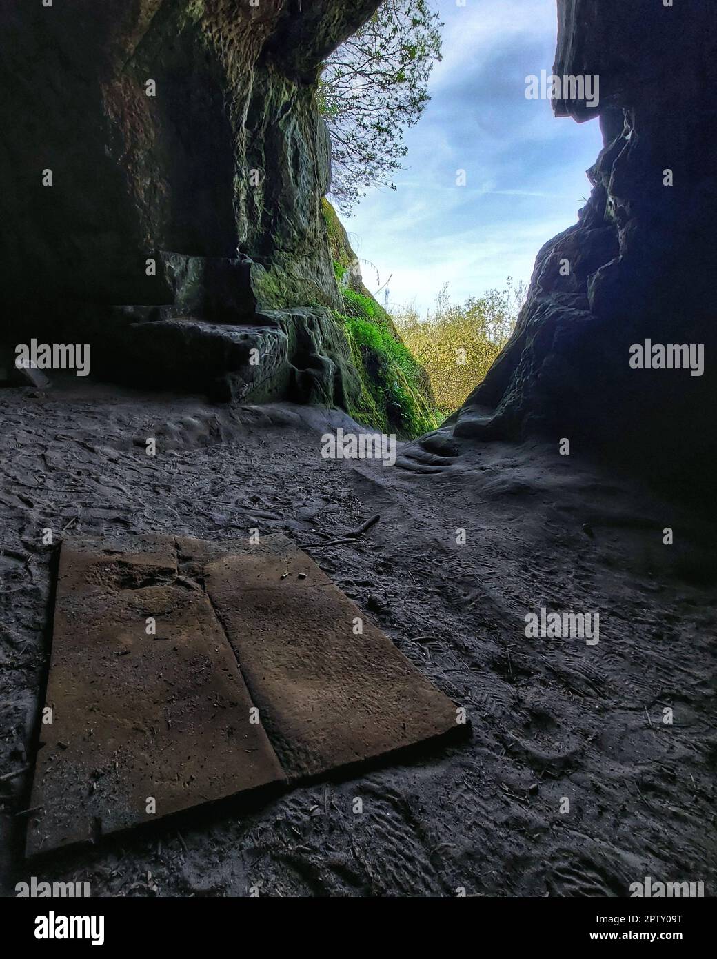 Cave with a simple mat used as a retreat for meditation Stock Photo - Alamy