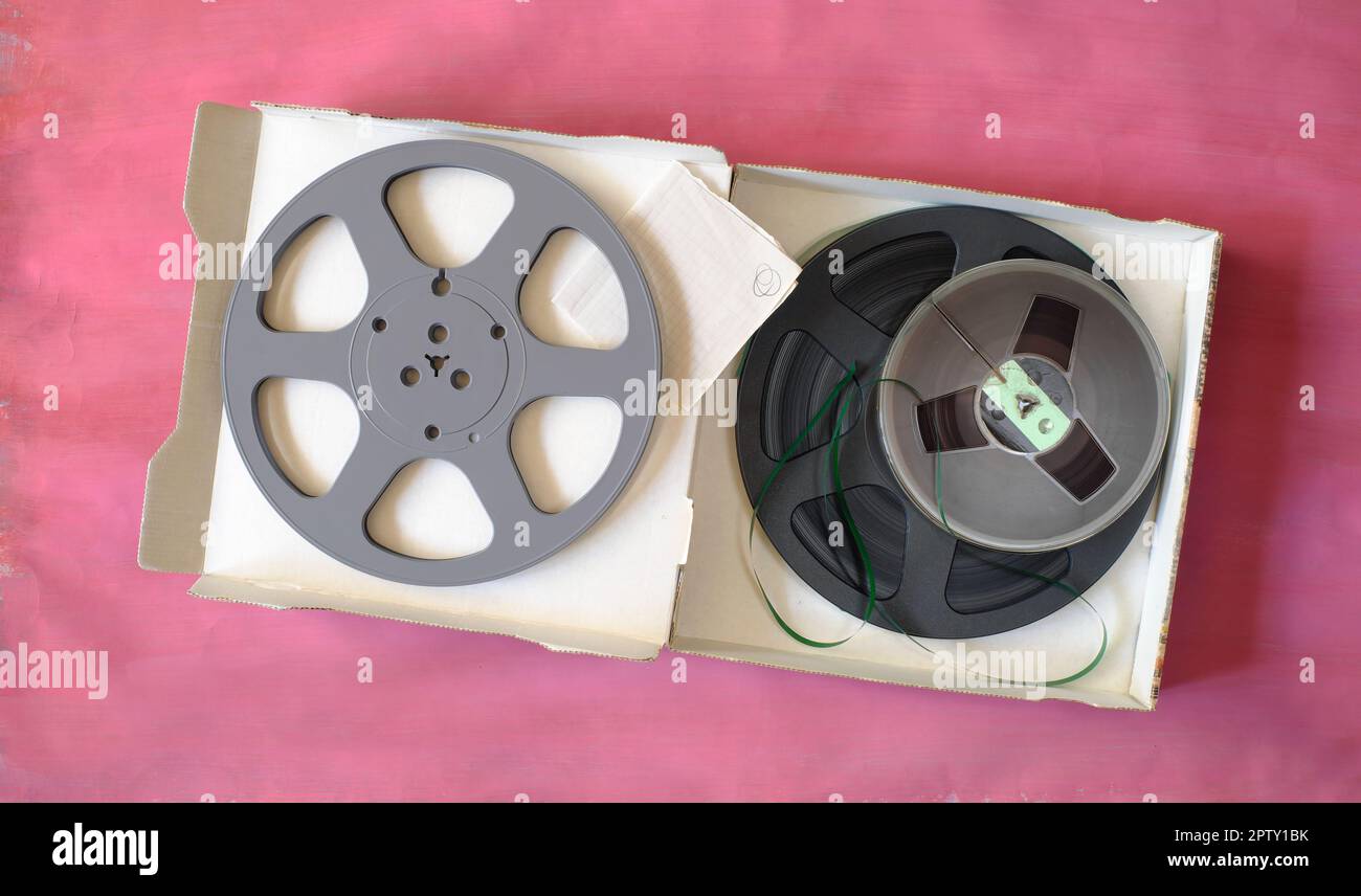 Vintage magnetic audio reel in cardboard box and blank paper inlay ...