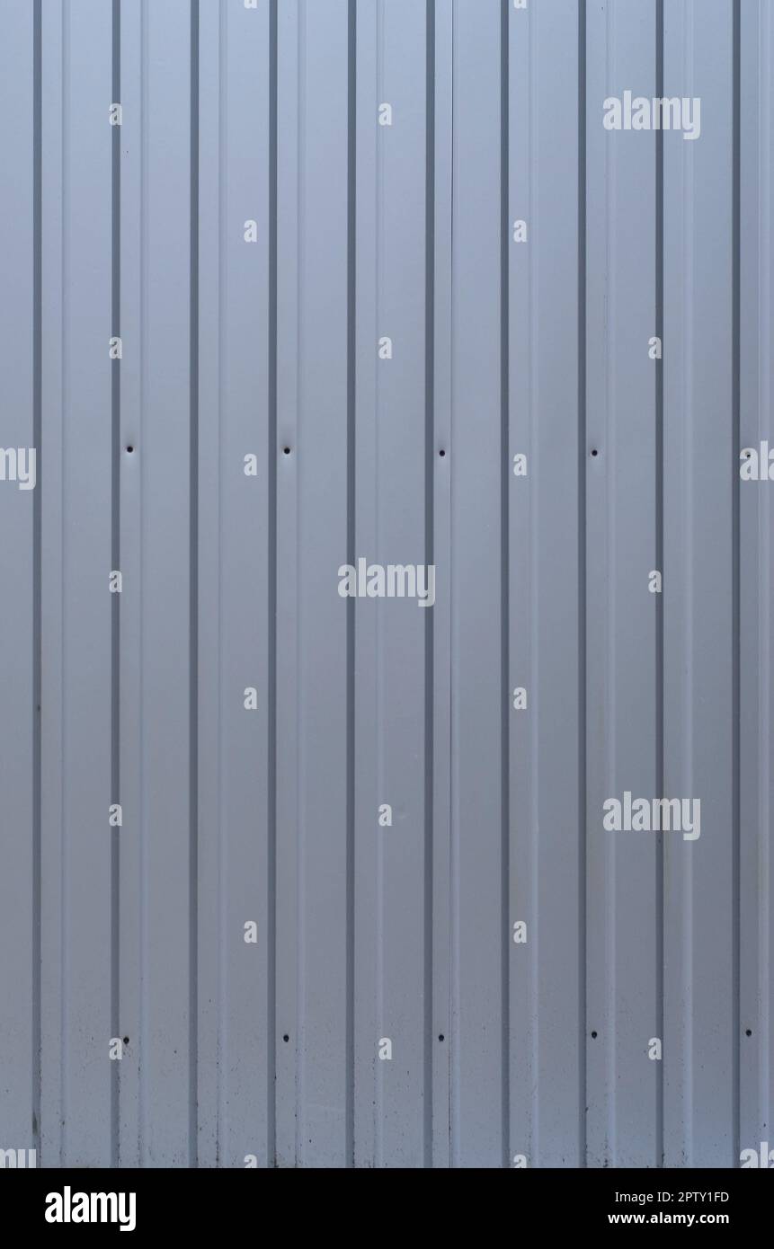 Siding, metal panels texture closeup in the daytime outdoors. Metal ...
