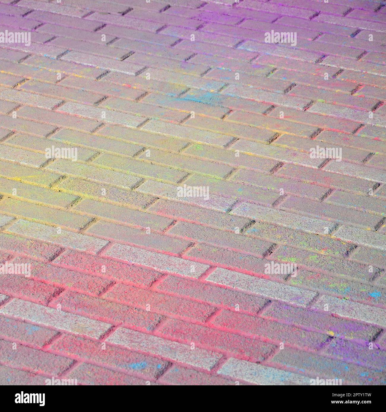 Multi colored earth, paving slabs, powder coated with dry colors at the ...