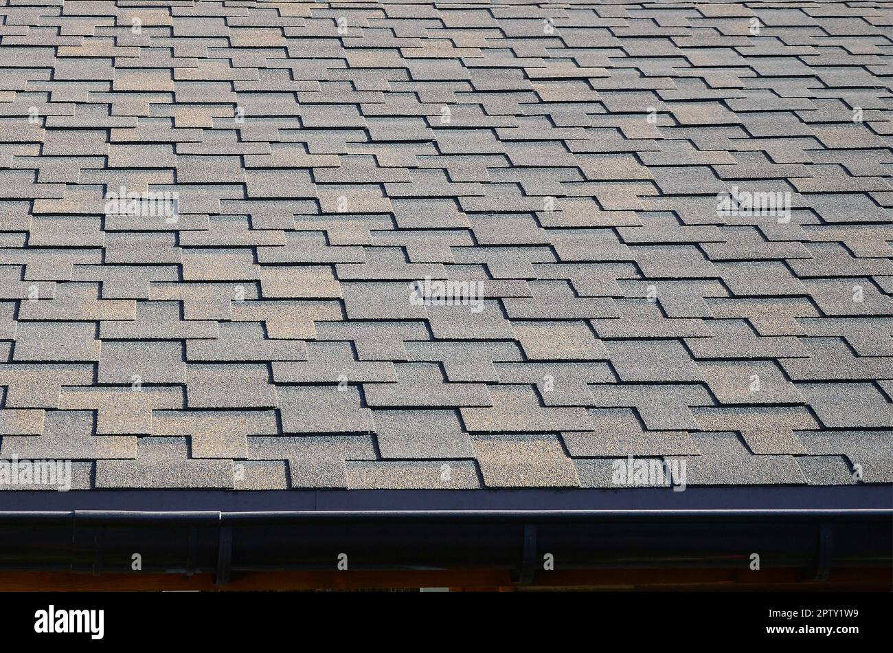 Modern roofing and decoration of chimneys. Flexible bitumen or slate ...