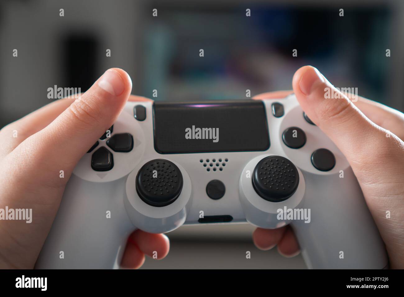 Male hands hold modified plastic joystick closeup, selective focus ...