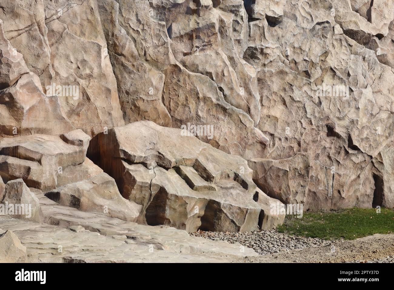 Light coarse natural rock stone background. Mining cliff rough front ...