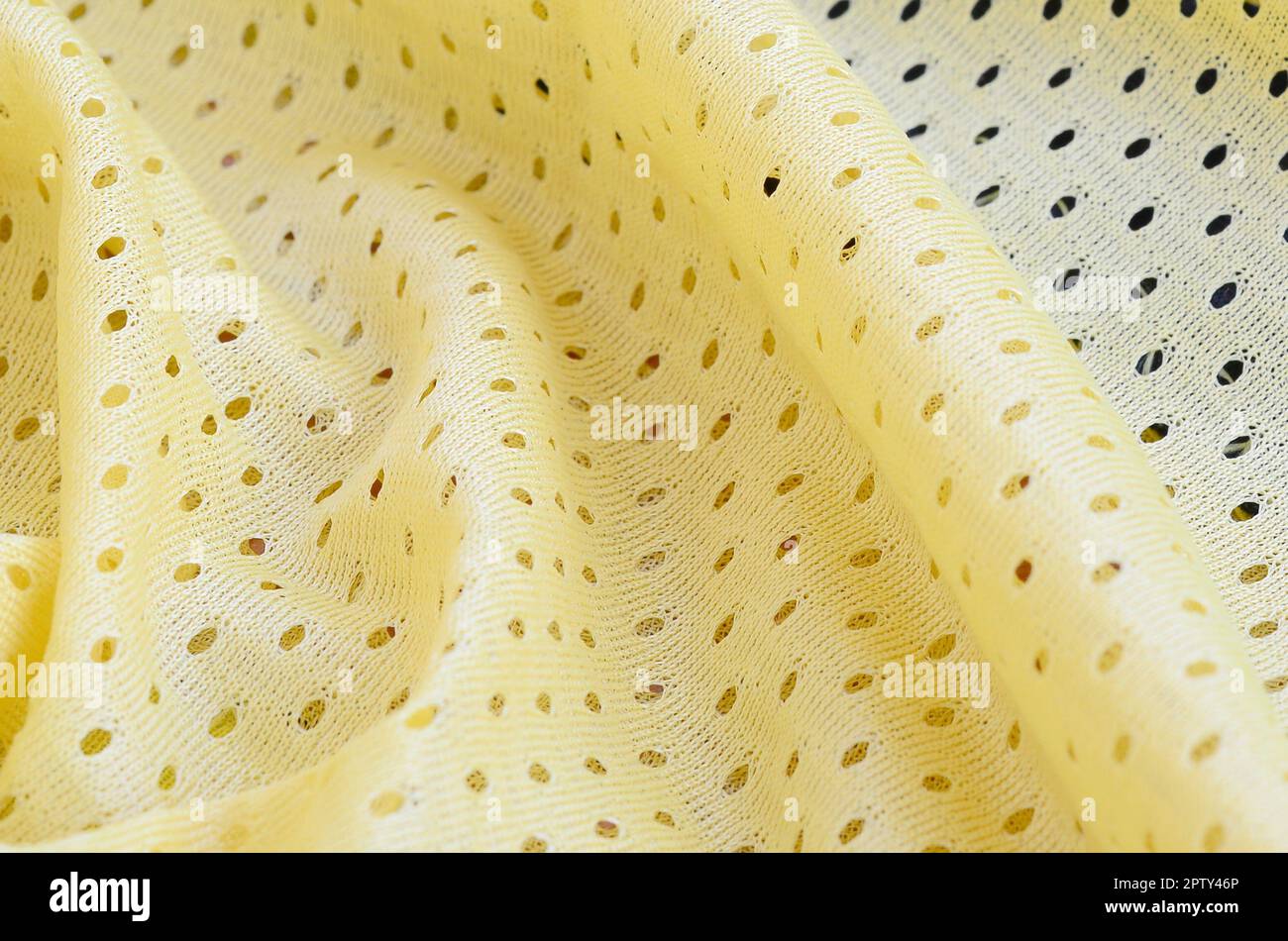Yellow mesh sport wear fabric textile pattern background. Yellow color ...