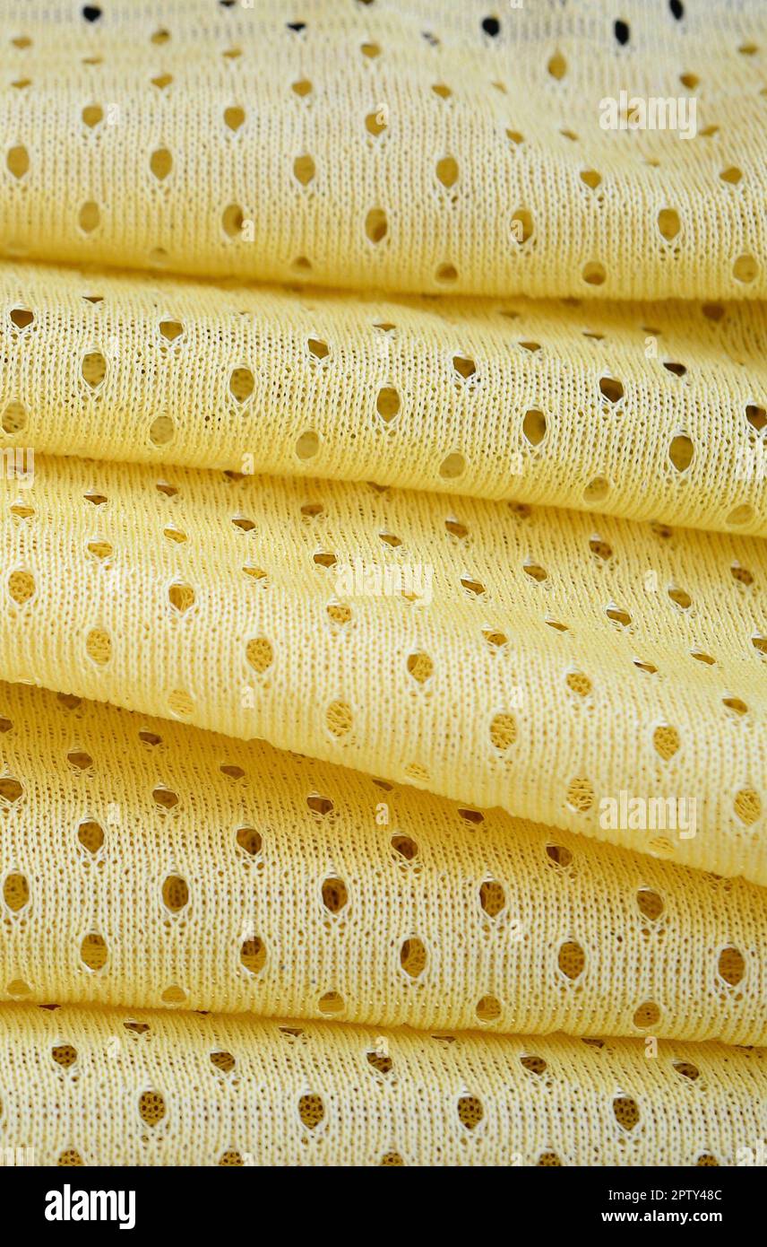 Yellow mesh sport wear fabric textile pattern background. Yellow color ...
