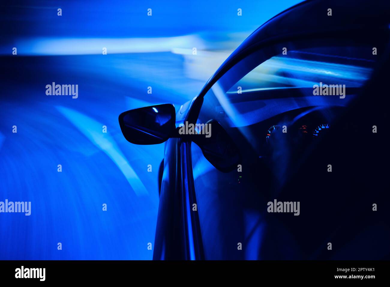 Motion timelapse of a speedy night drive in a big city ending in the ...