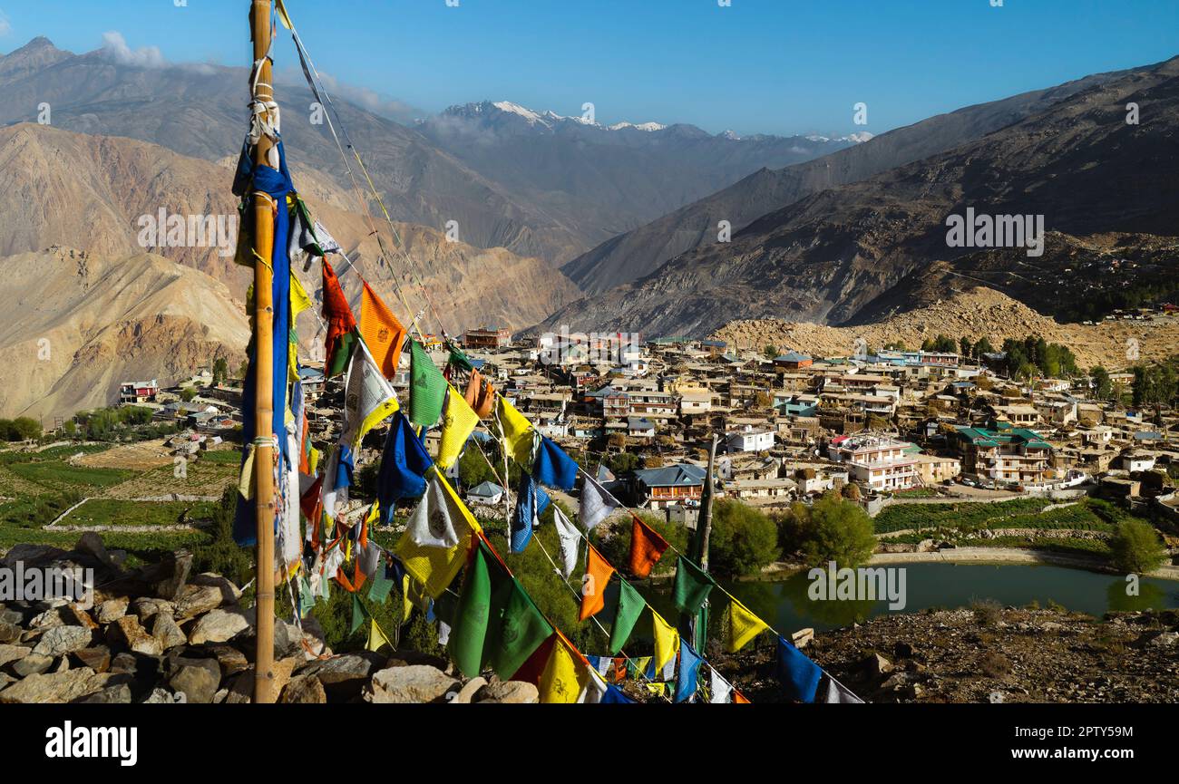 Elevated view of Nako village flanked by Himalayas and lake with ...