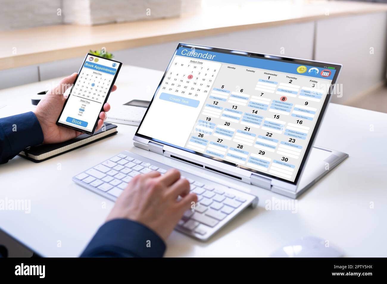 Man Organizing Appointment Schedule Using Cellphone And Calendar Stock ...