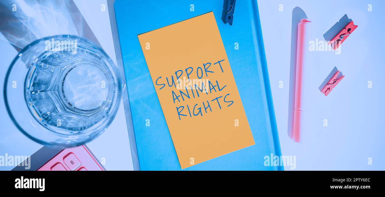 Hand writing sign Support Animal Rights, Word for protection and proper ...