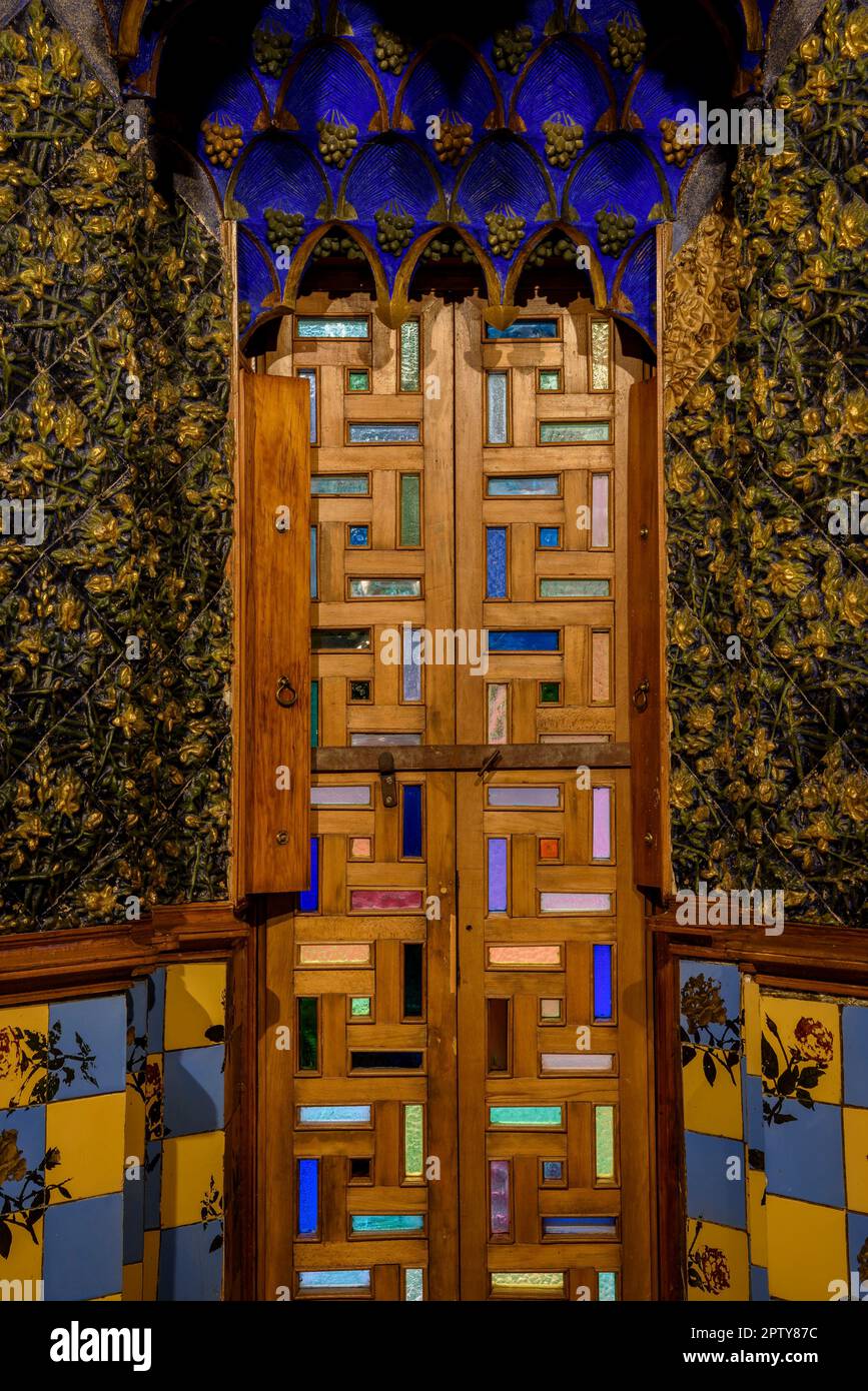 Detail of a door and stained glass windows in the smoking room of the ...