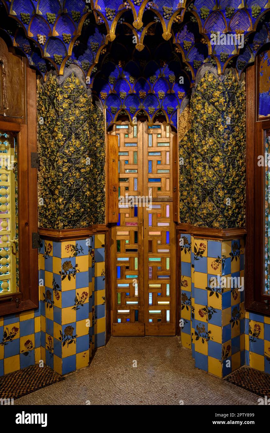 Detail of a door and stained glass windows in the smoking room of the ...