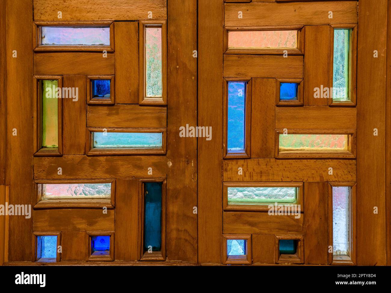 Detail of a door and stained glass windows in the smoking room of the ...