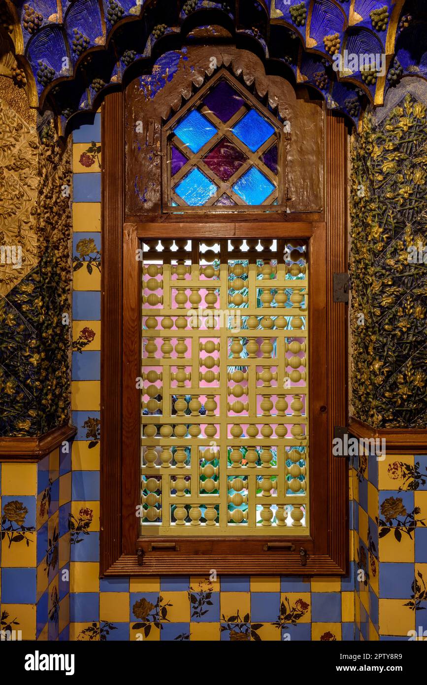 Detail of a window and stained glass windows in the smoking room of the ...