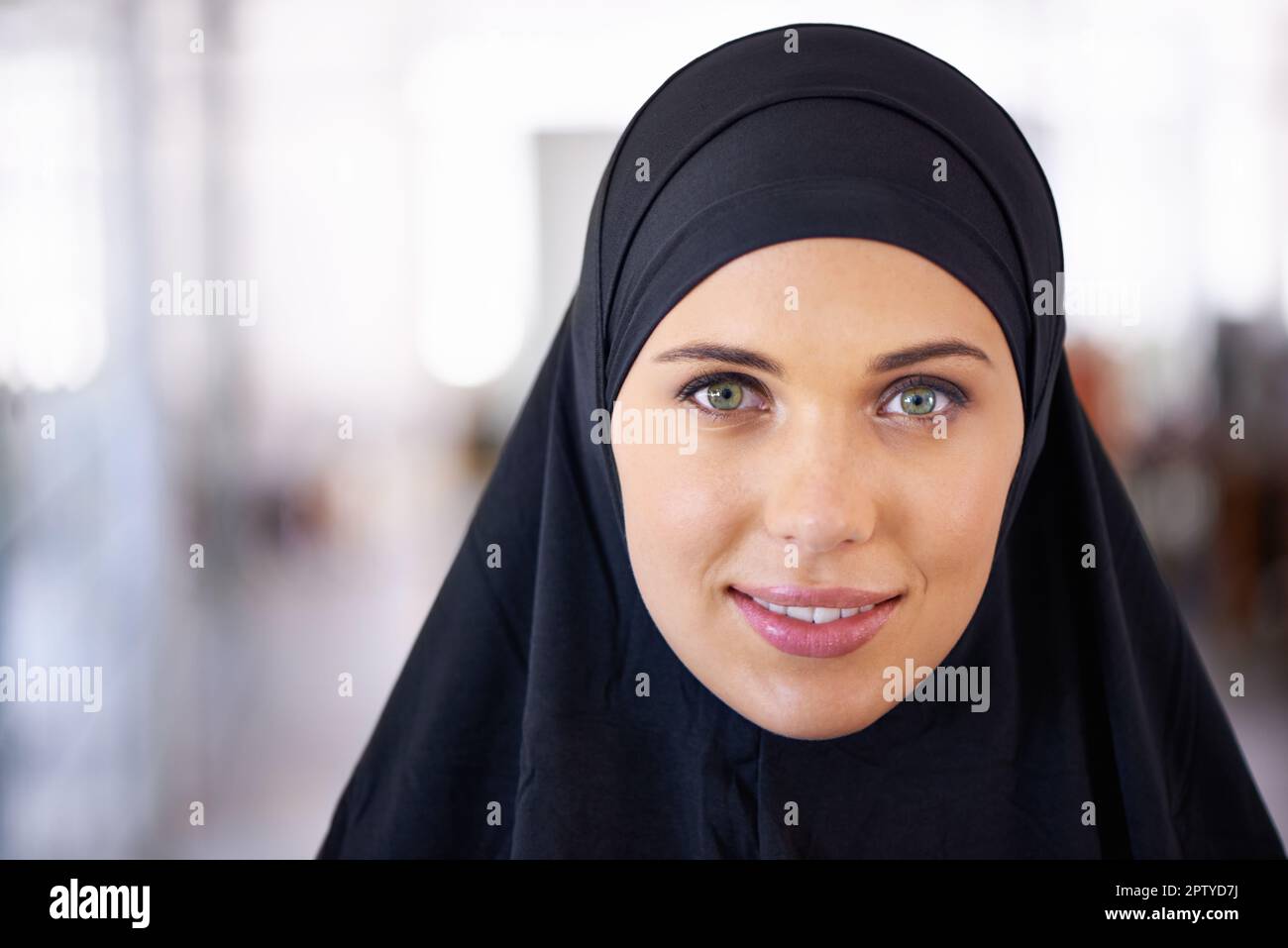 Her beauty is revealed. Portrait of a muslim woman wearing a hijab ...