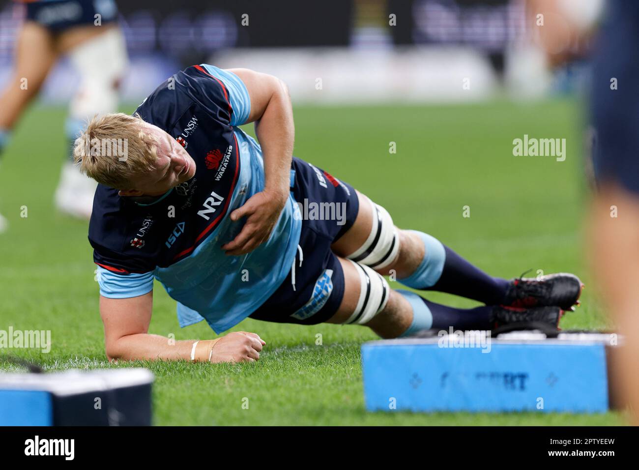 Sydney, Australia. 28th Apr, 2023. Hugh Sinclair of the Waratahs warms ...