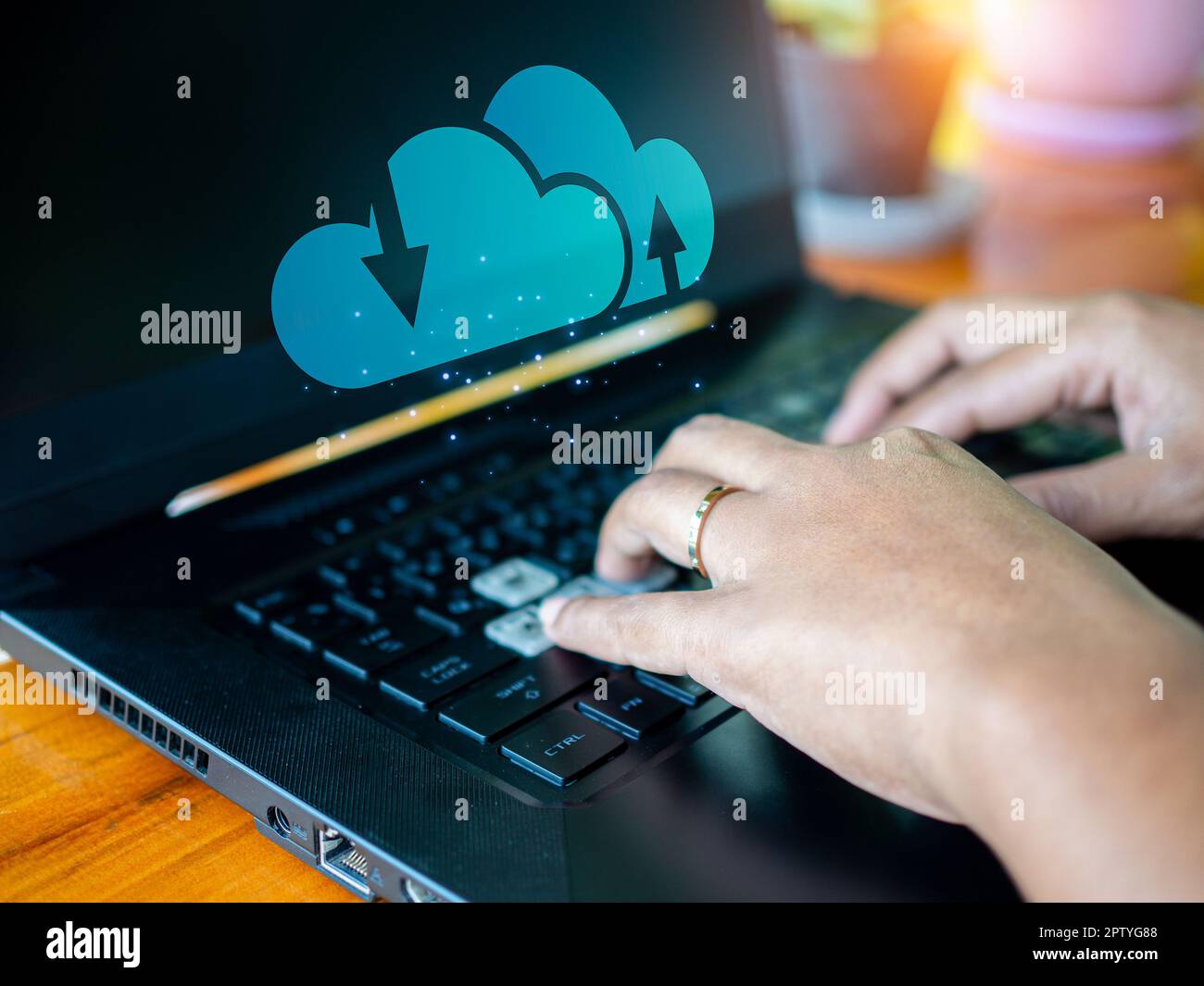 Human hand working on computer and cloud icon. Cloud computing concept ...