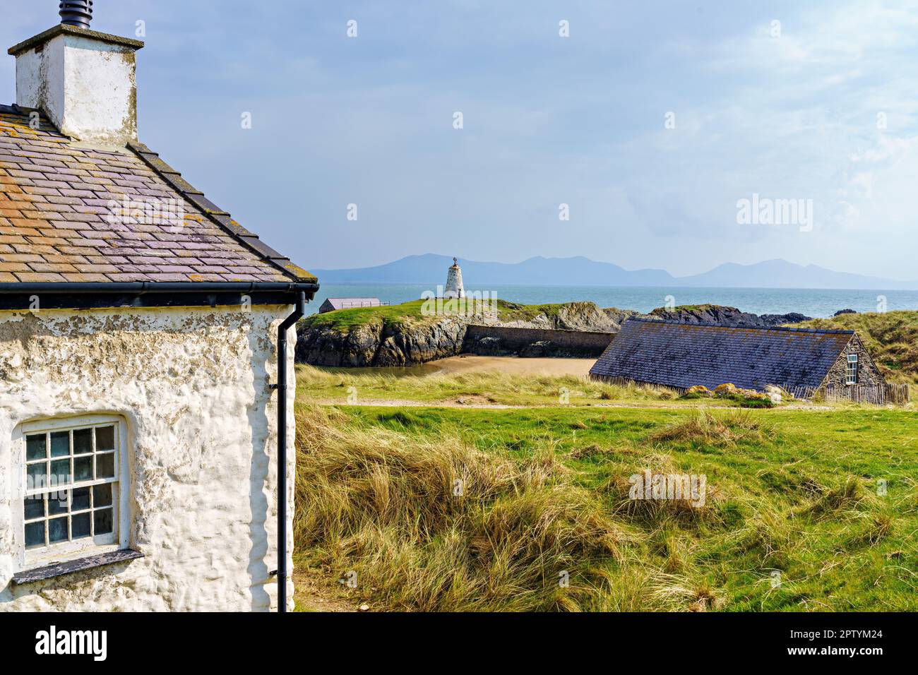 The Pilots Cottages on Llanddwyn Island in North Wales, with its famous ...