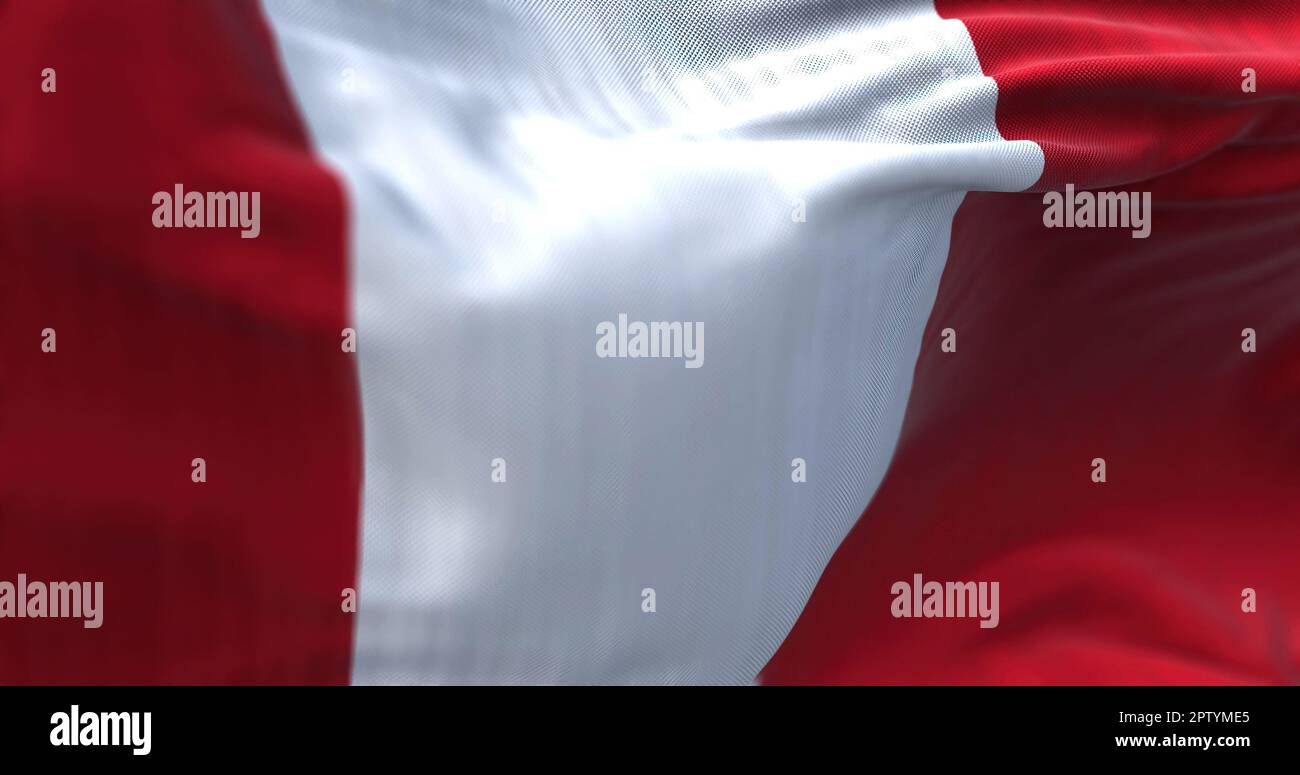 Close-up view of the Peru national flag waving in the wind. The ...