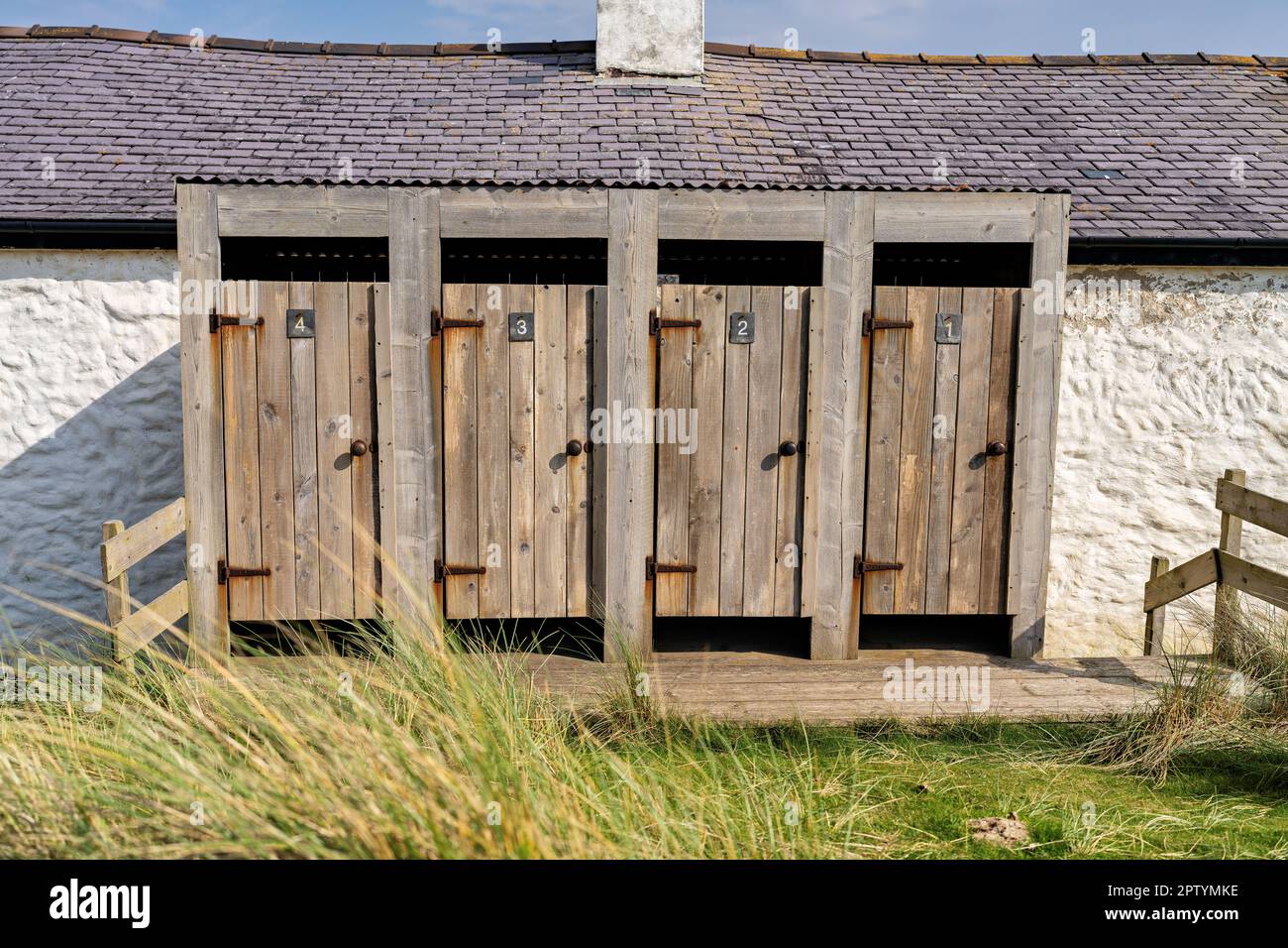 The Pilots Cottages on Llanddwyn Island in North Wales, with its famous ...