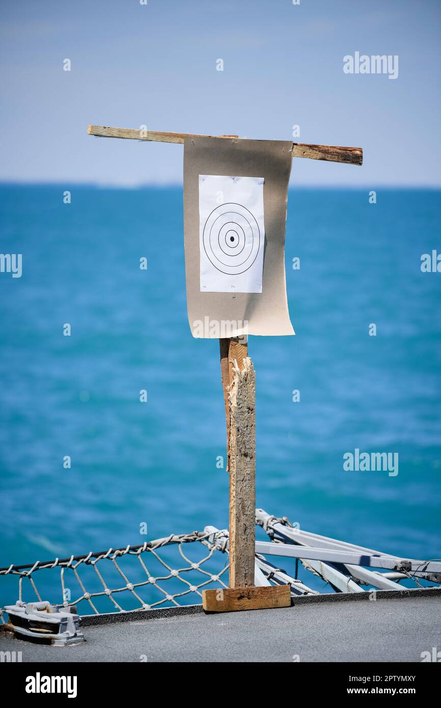 Color image of a paper shooting target on a pole Stock Photo - Alamy