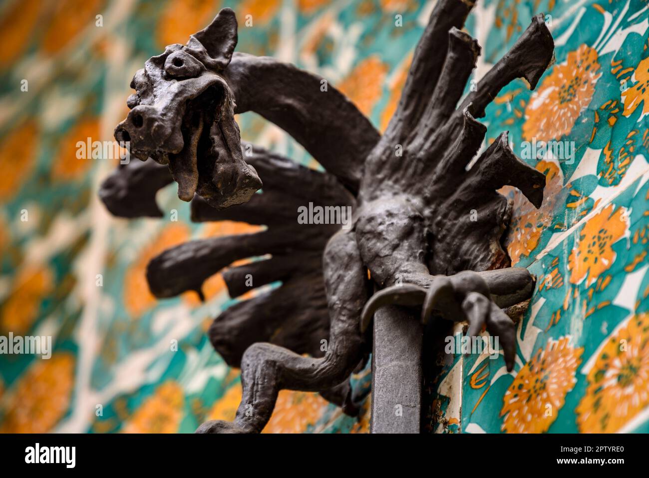 Wrought iron details on the fence of a window on the facade of the Casa ...
