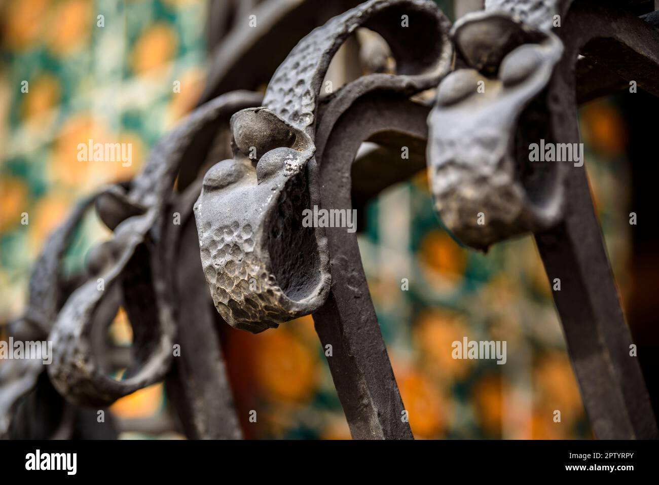 Wrought iron details on the fence of a window on the facade of the Casa ...