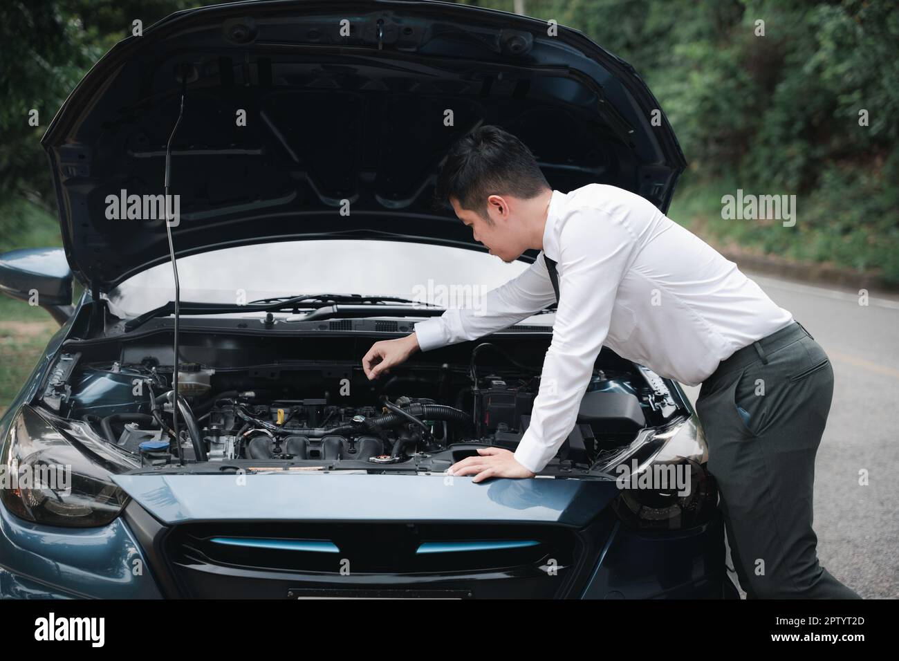 Asian businessman car broken breakdown, young stressed man having ...