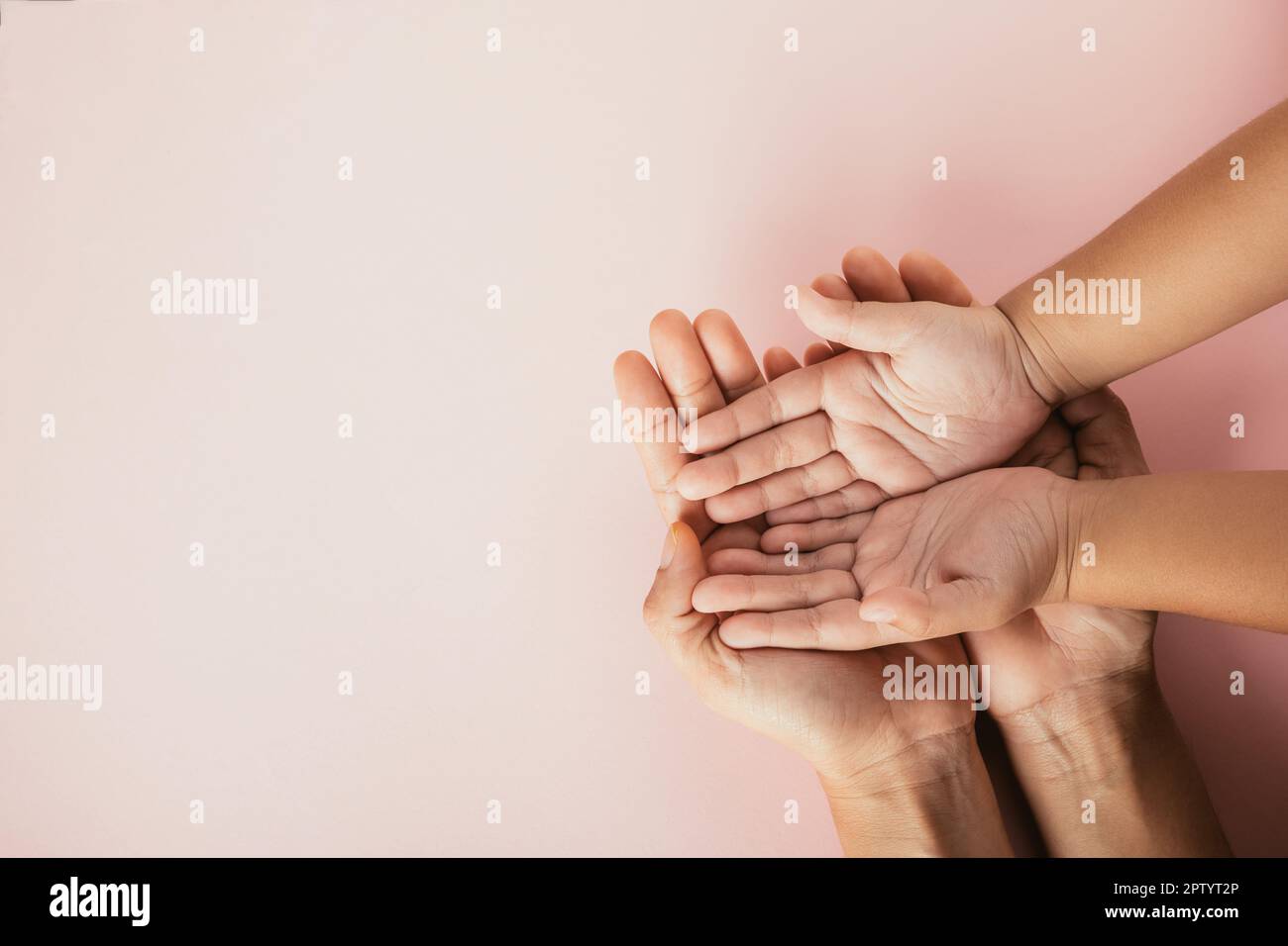 Close up hands children on adult mother hand, Top view person kid stack ...
