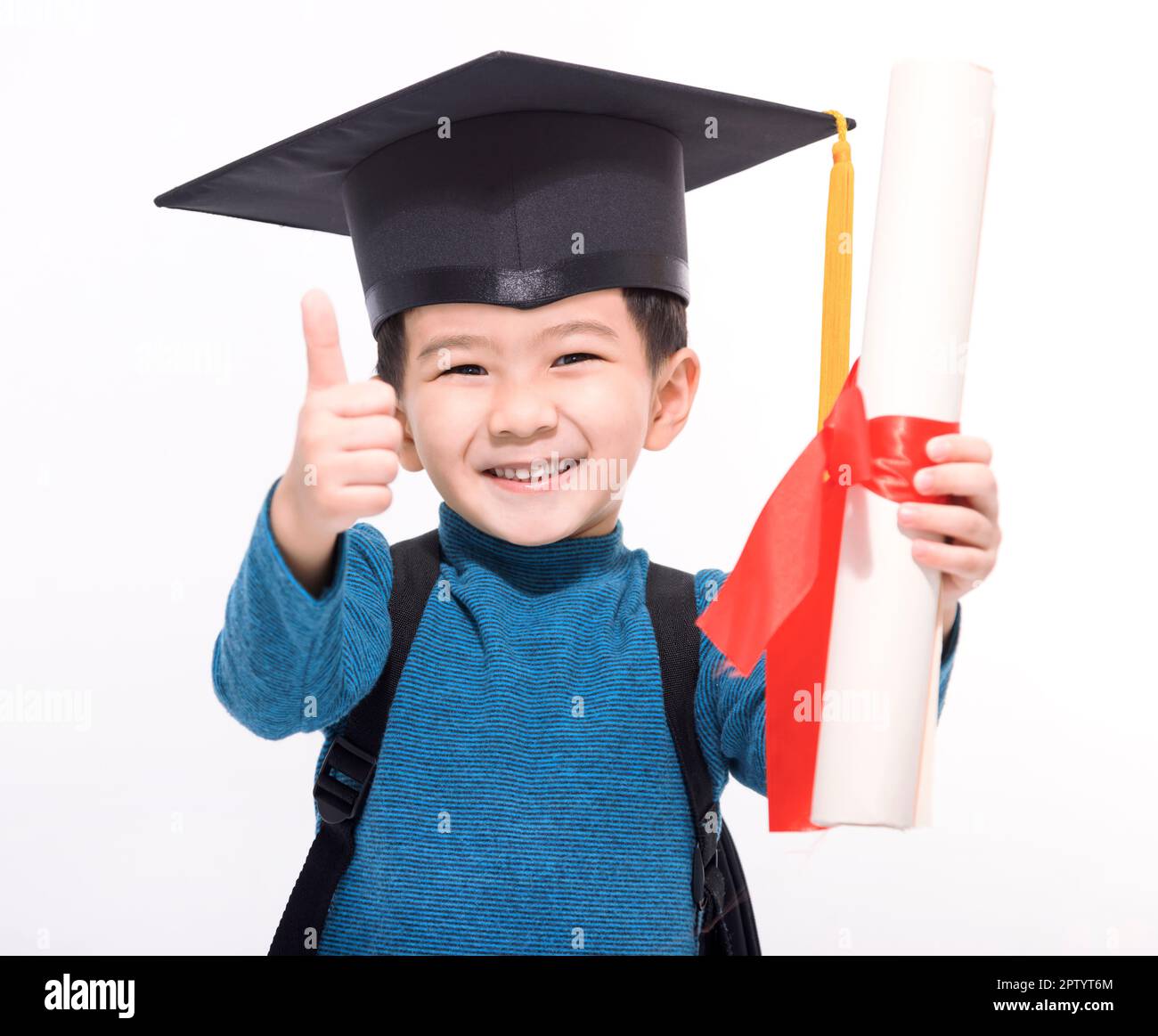 Happy graduate boy student showing the diploma and thumbs up Stock ...