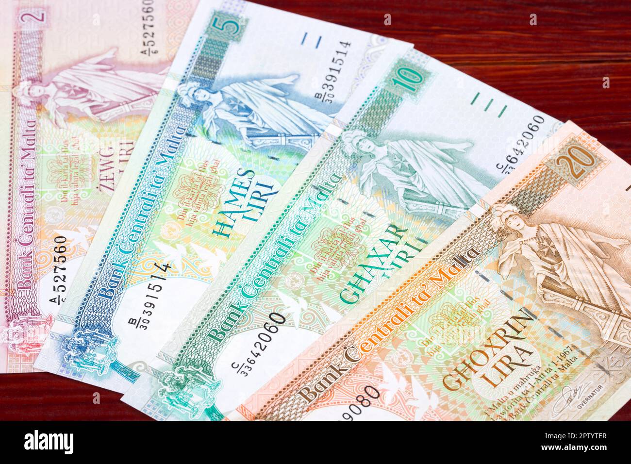 Maltese money - lira a business background Stock Photo - Alamy
