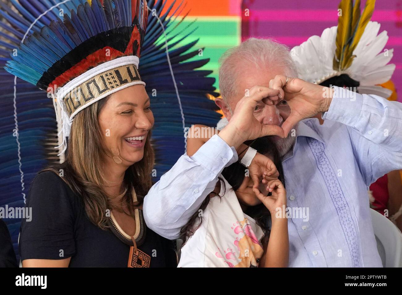 Brazilian President Luiz Inacio Lula da Silva makes a heart sign ...