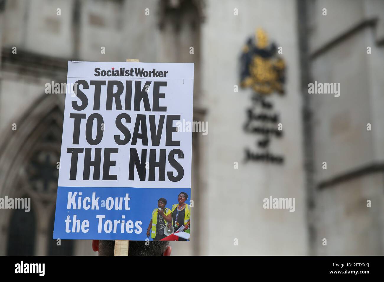 London, UK. 27th Apr, 2023. A 'Strike To Save The NHS' placard seen ...