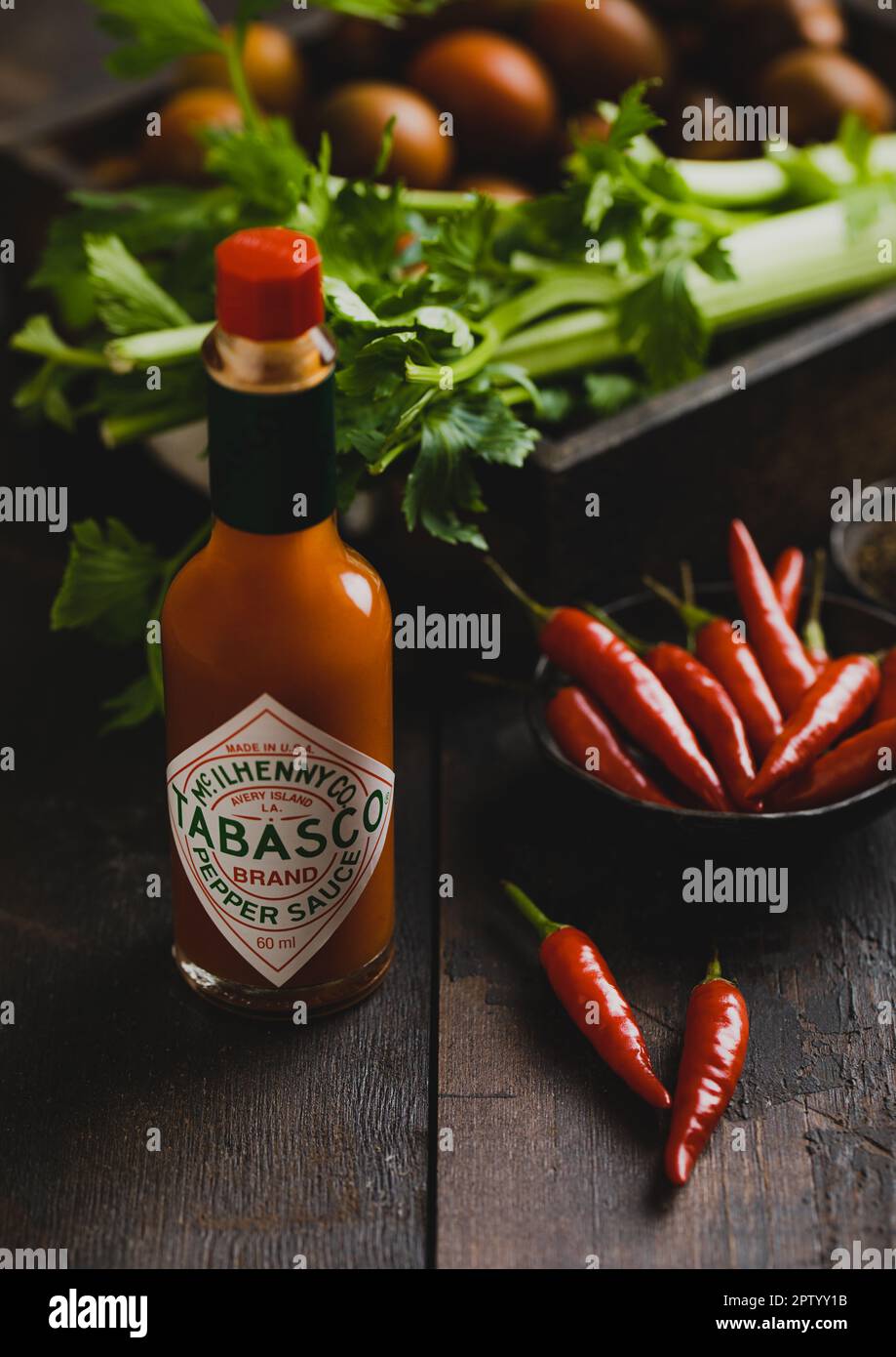 LONDON, UK - MARCH 22, 2023: Tabasco red pepper sauce bottle on wooden ...