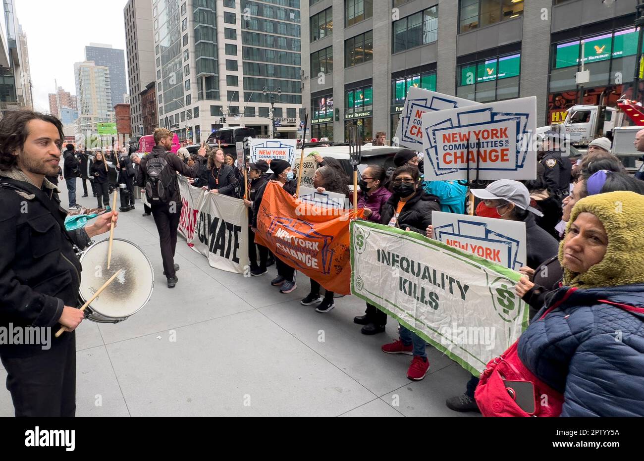 New York, USA. 28th Apr, 2023. Climate Change protestors throw black ...